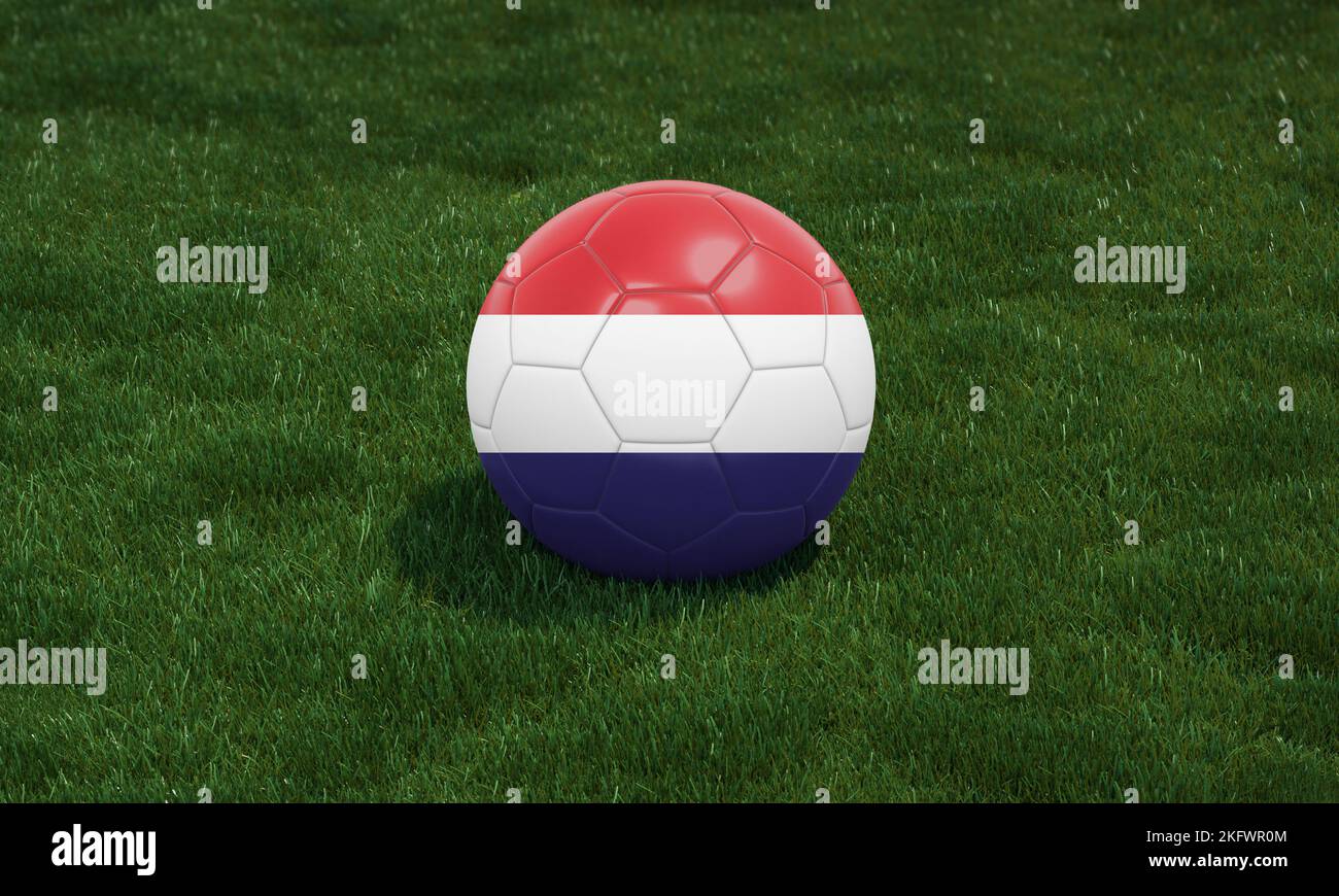 Soccer ball with Netherlands flag colors at a stadium on green grasses ...