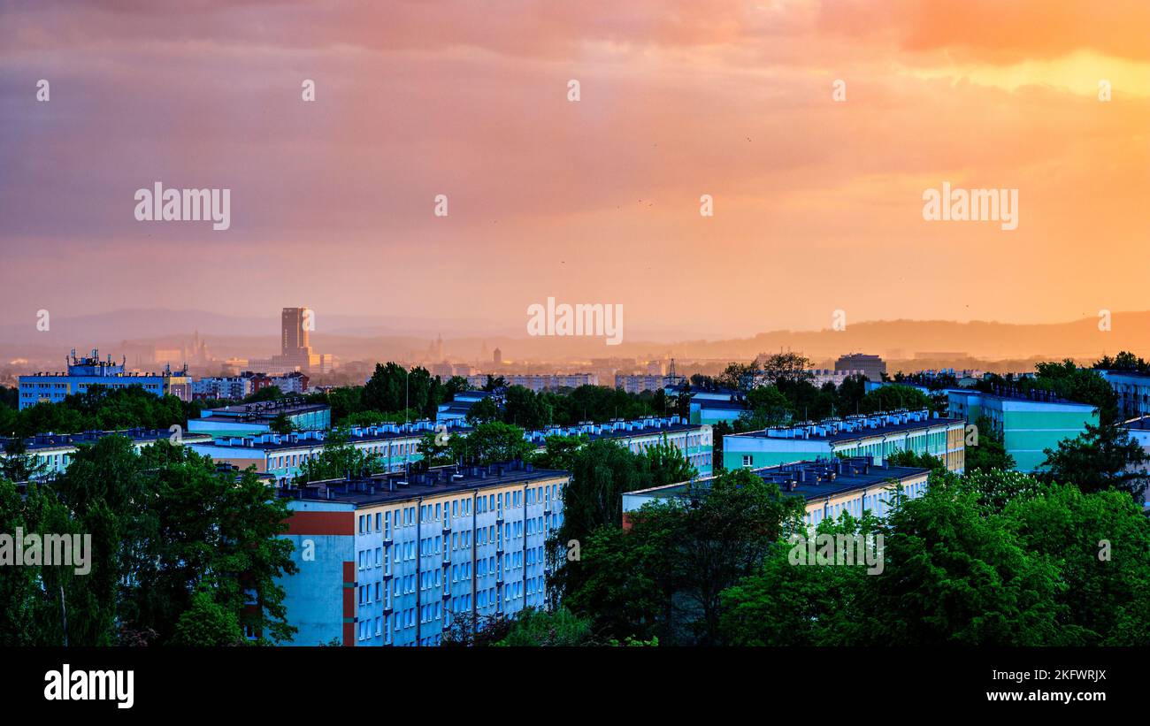 Bright orange sunset over peaceful city Stock Photo - Alamy