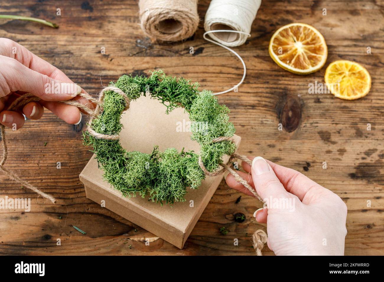 Wrapping Christmas gifts. Hobby time Stock Photo - Alamy