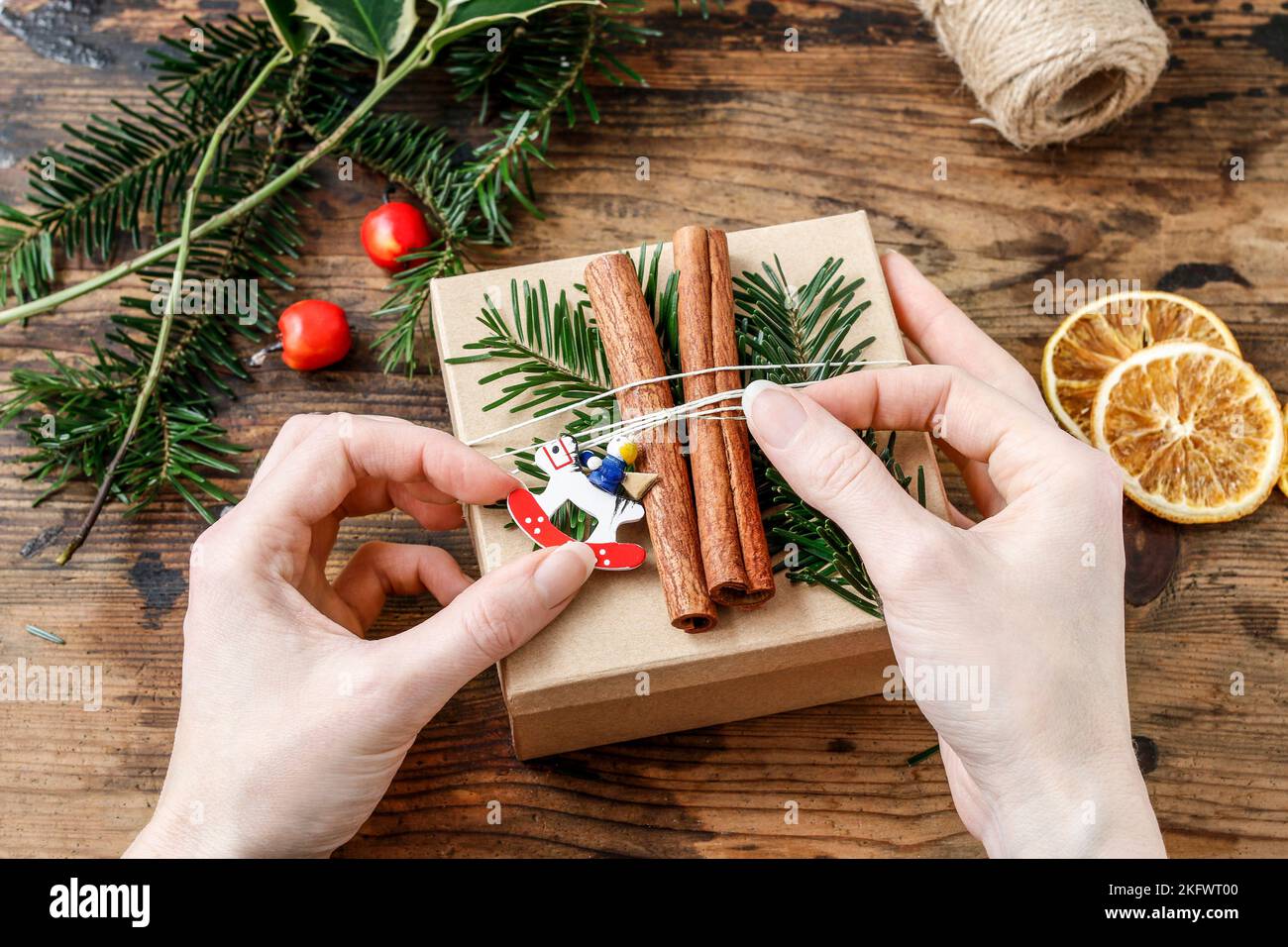 Wrapping Christmas gifts. Hobby time Stock Photo - Alamy