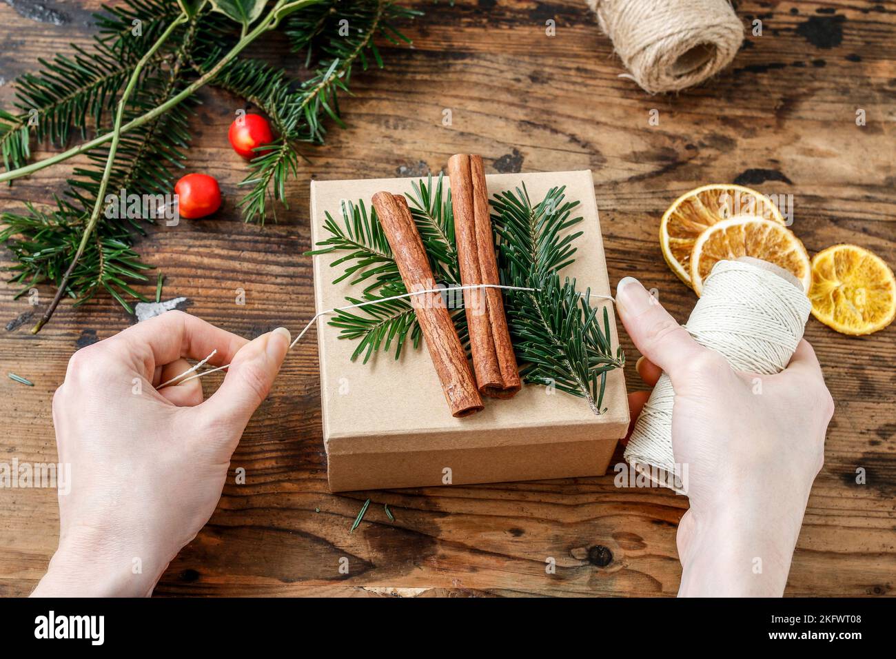 Wrapping Christmas gifts. Hobby time Stock Photo - Alamy