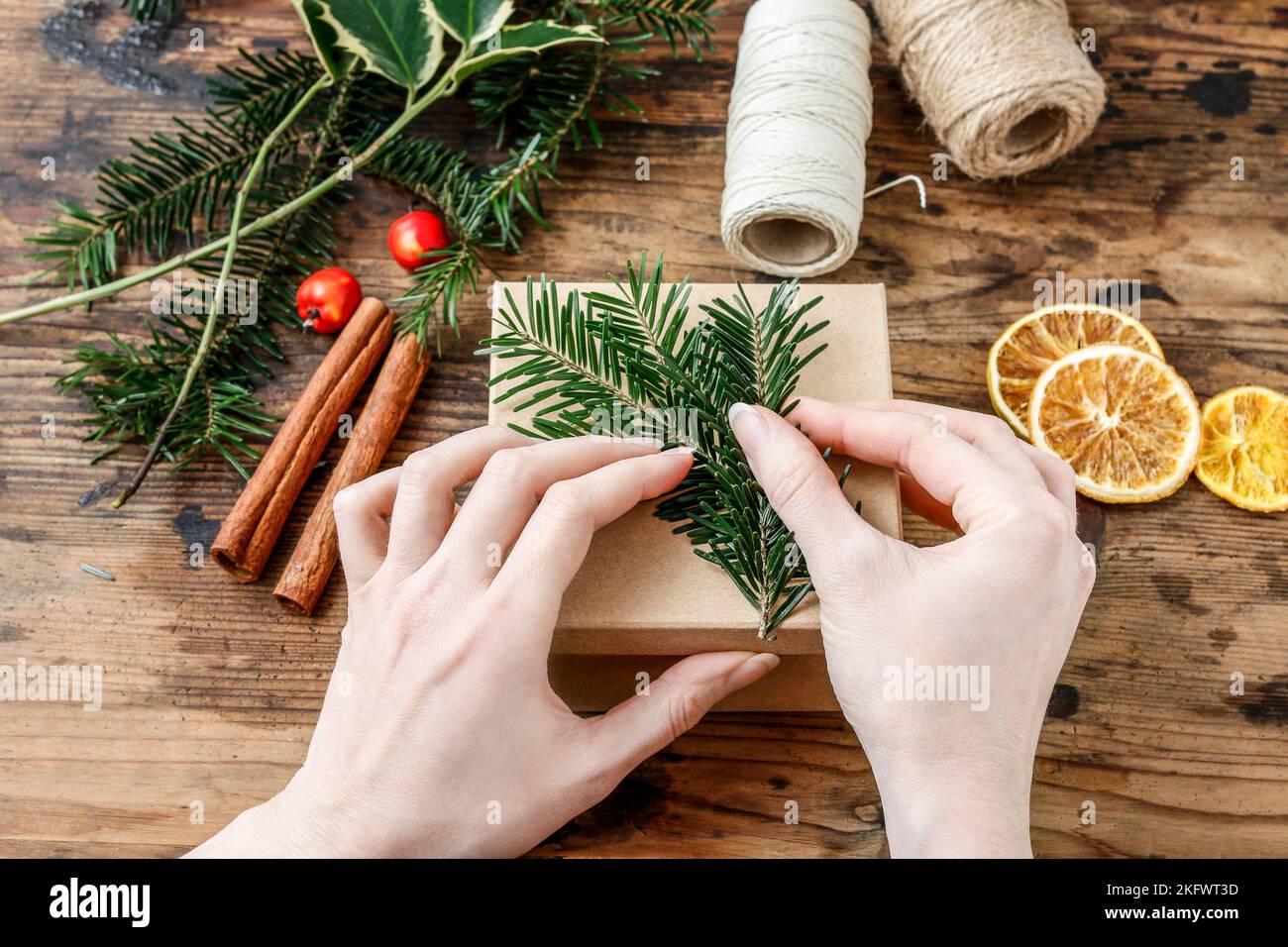 Wrapping Christmas gifts. Hobby time Stock Photo - Alamy