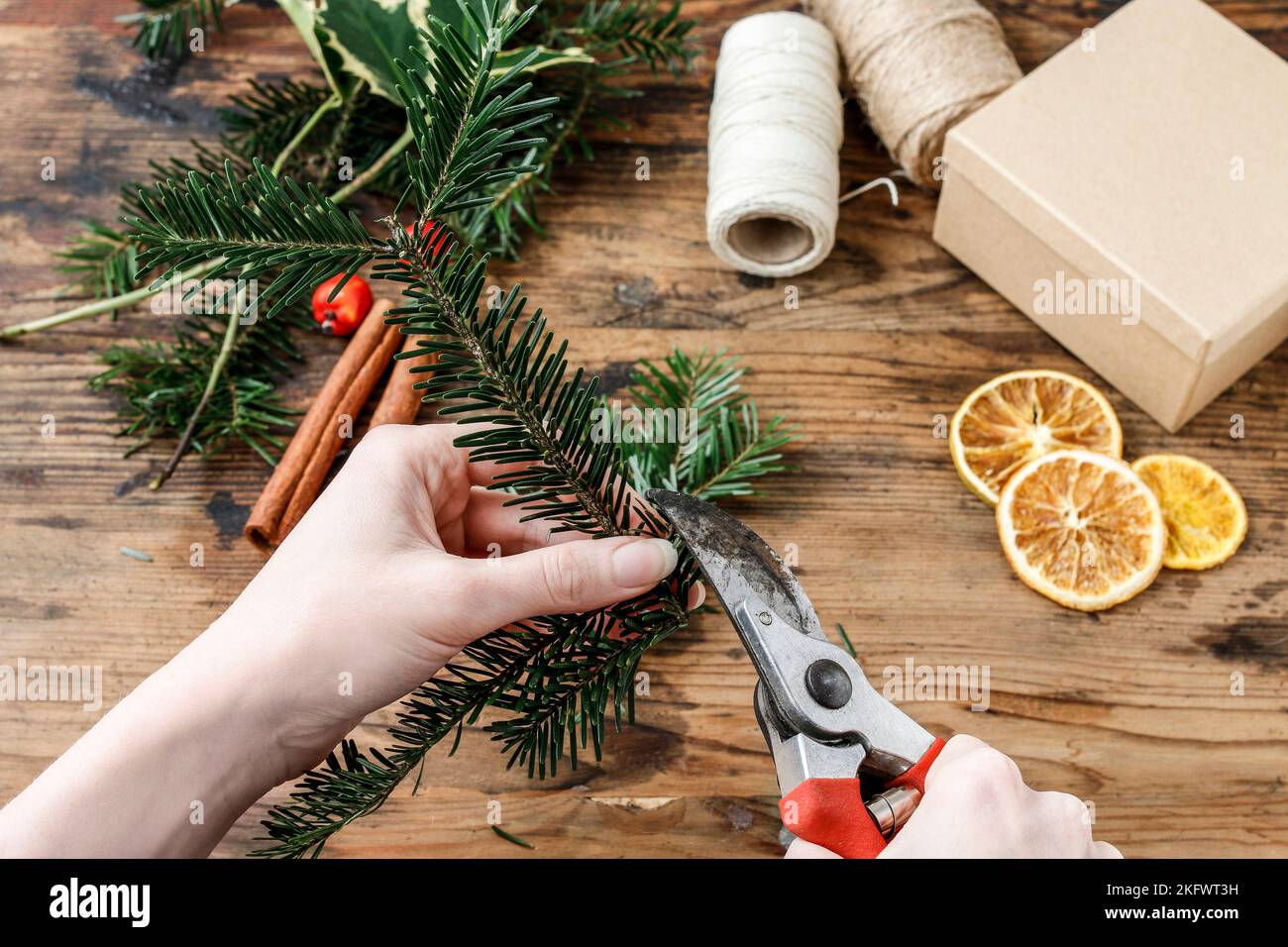 Wrapping Christmas gifts. Hobby time Stock Photo - Alamy