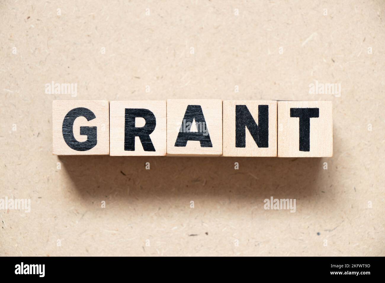 Alphabet letter block in word grant on wood background Stock Photo - Alamy