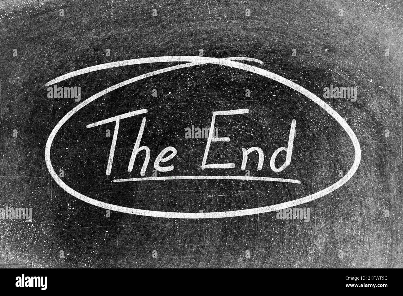 White chalk hand writing in word the end on blackboard background Stock ...