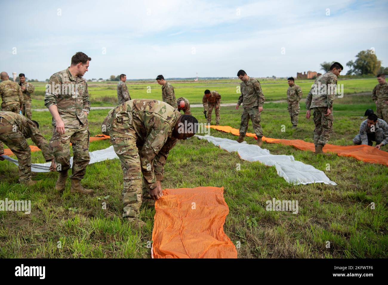 The 424th Air Base Squadron practice making emergency signals as part ...