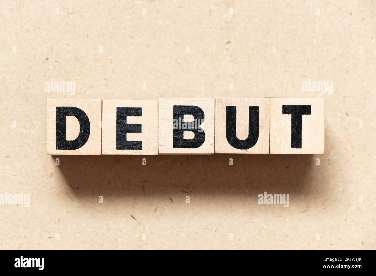 Alphabet letter block in word debut on wood background Stock Photo - Alamy