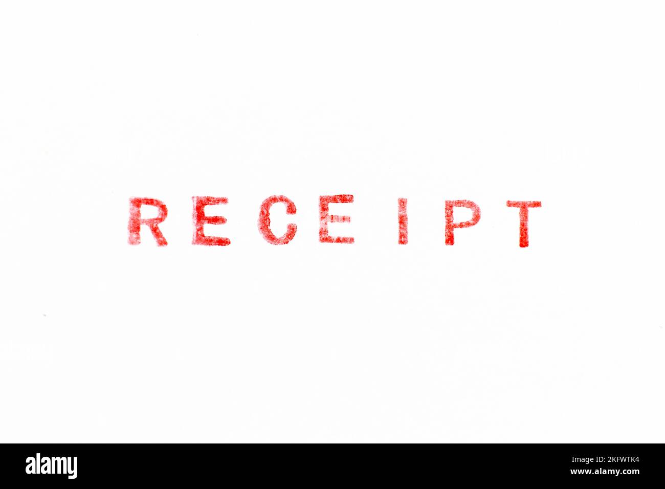 Red color ink rubber stamp in word receipt on white paper background ...