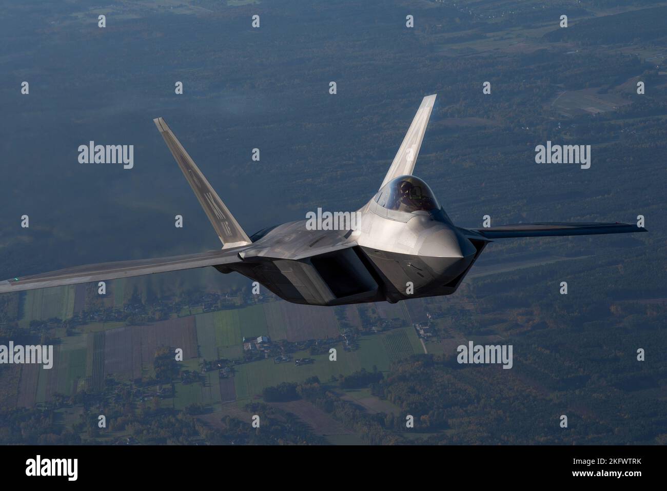 A U.S. Air Force F-22 Raptor assigned to the 90th Expeditionary Fighter ...