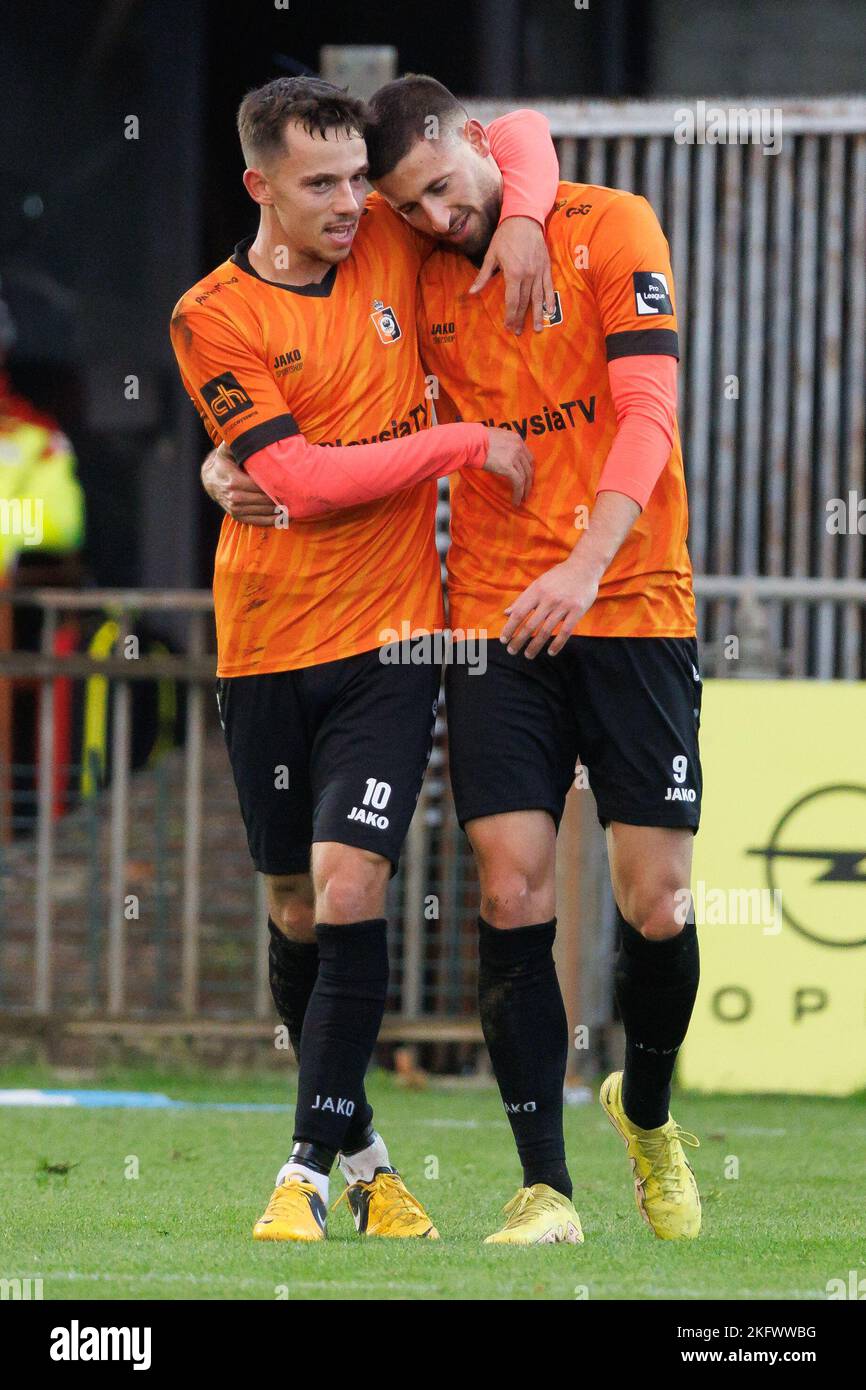 Deinze's Dylan De Belder celebrates after scoring during a soccer match ...