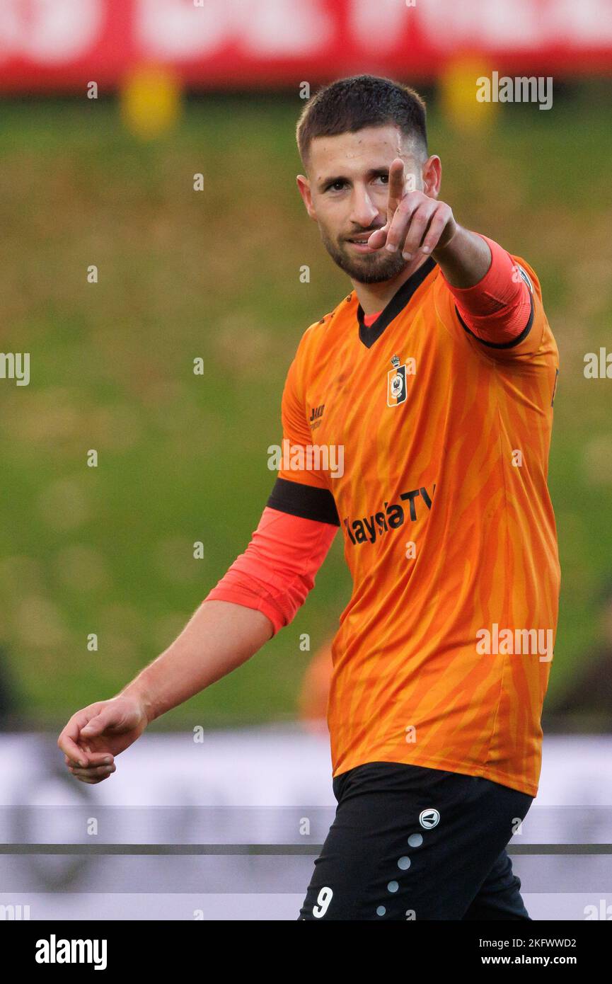 Deinze's Dylan De Belder celebrates after scoring during a soccer match ...