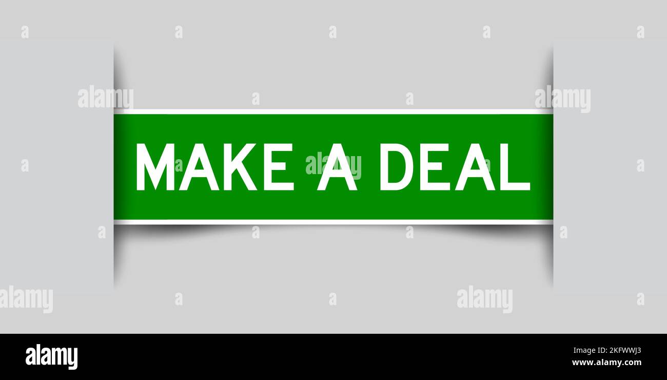 Inserted green color label sticker with word make a deal on gray ...