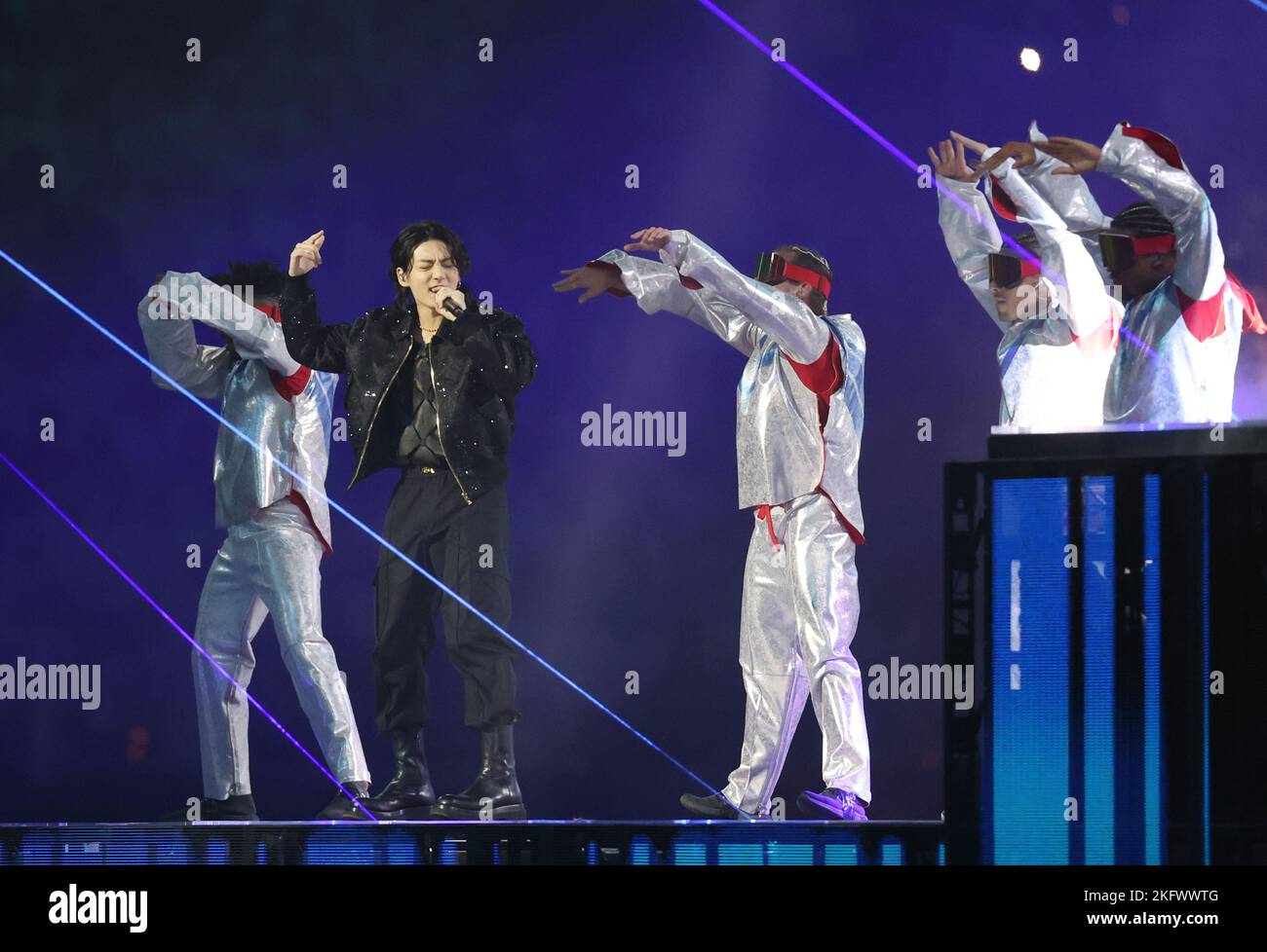 Al Khor, Qatar. 20th Nov, 2022. Singer Jung Kook (2nd L) of South Korea ...