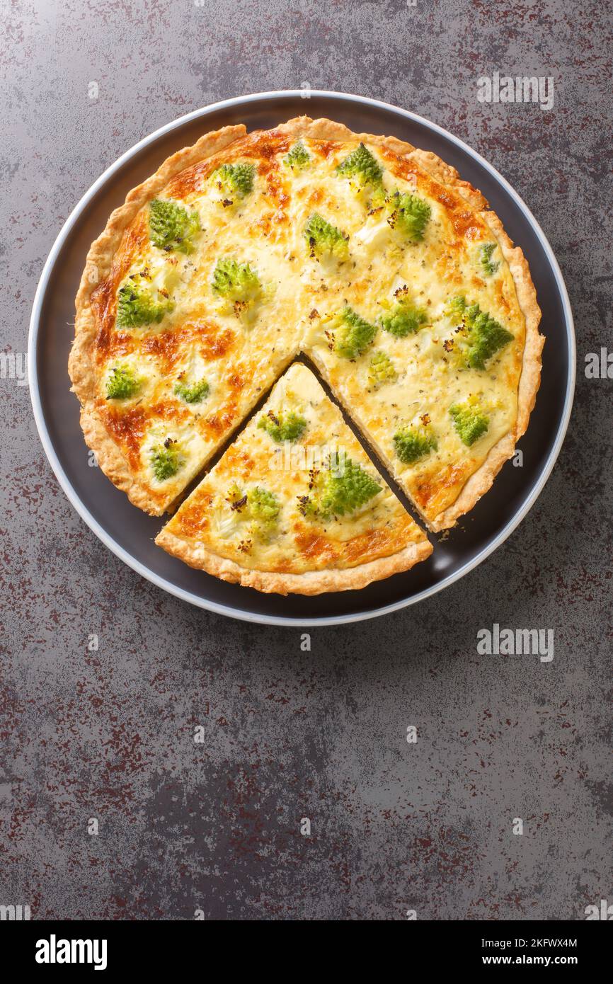 Homemade romanesco broccoli and cheese pie close-up in a plate on the ...