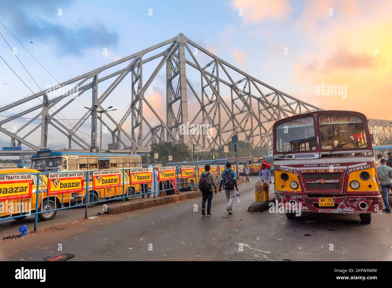 Public transport bus on city road near Howrah bridge Kolkata, India at ...
