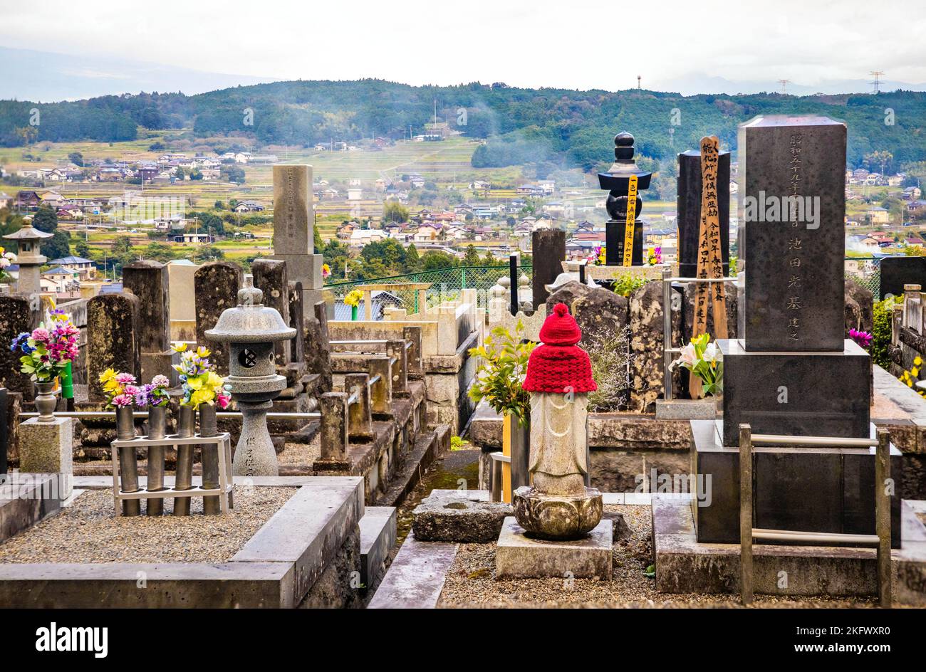 Traditional japanese cemetery tombstones and statues nobody Stock Photo ...