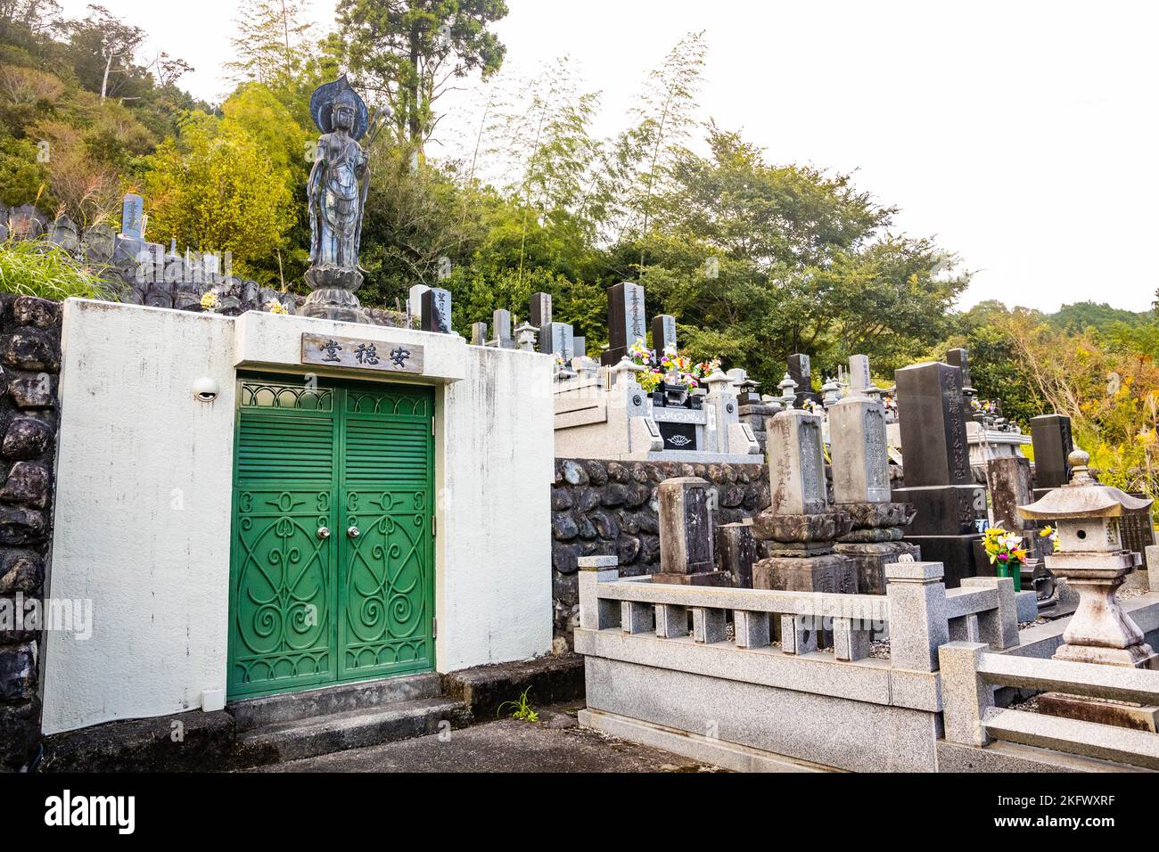 Traditional japanese cemetery tombstones and statues nobody Stock Photo ...