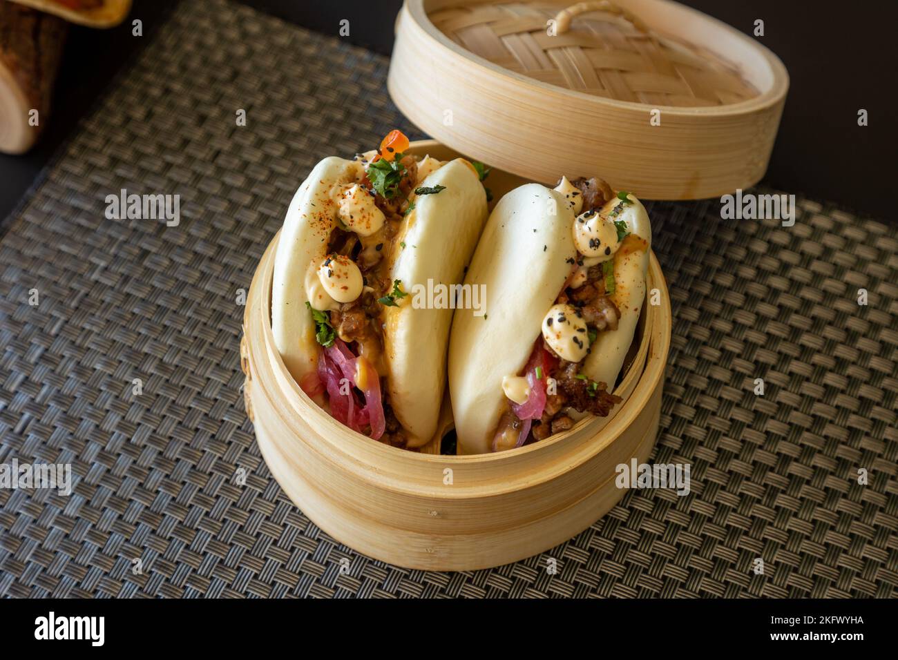 A closeup of delicious Gua bao or pork belly buns, traditionally served ...