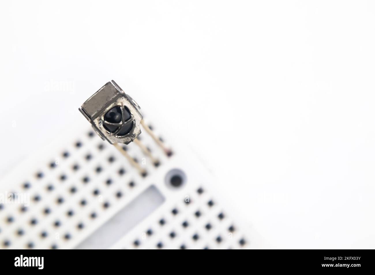 An IR receiver embedded in a project board on a white background. This ...