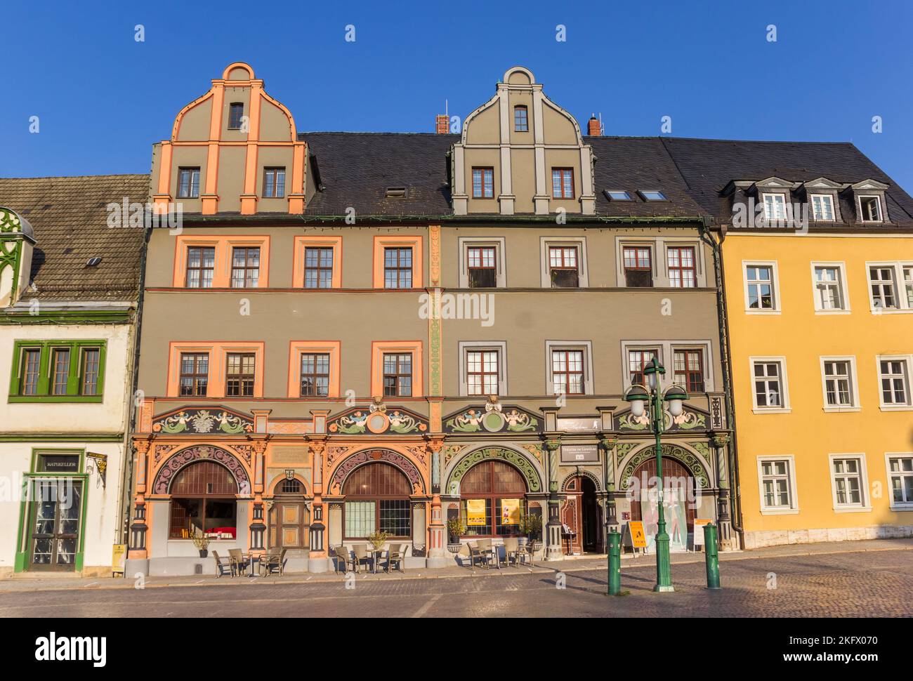 Facades of historic buildings on the market square of Weimar, Germany ...