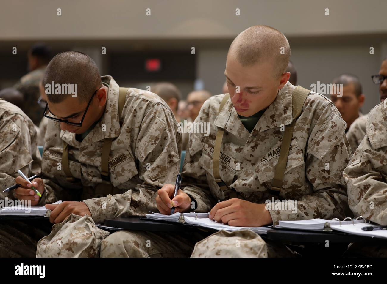Recruits with Charlie Company, 1st Recruit Training Battalion, receive a tactical combat ...