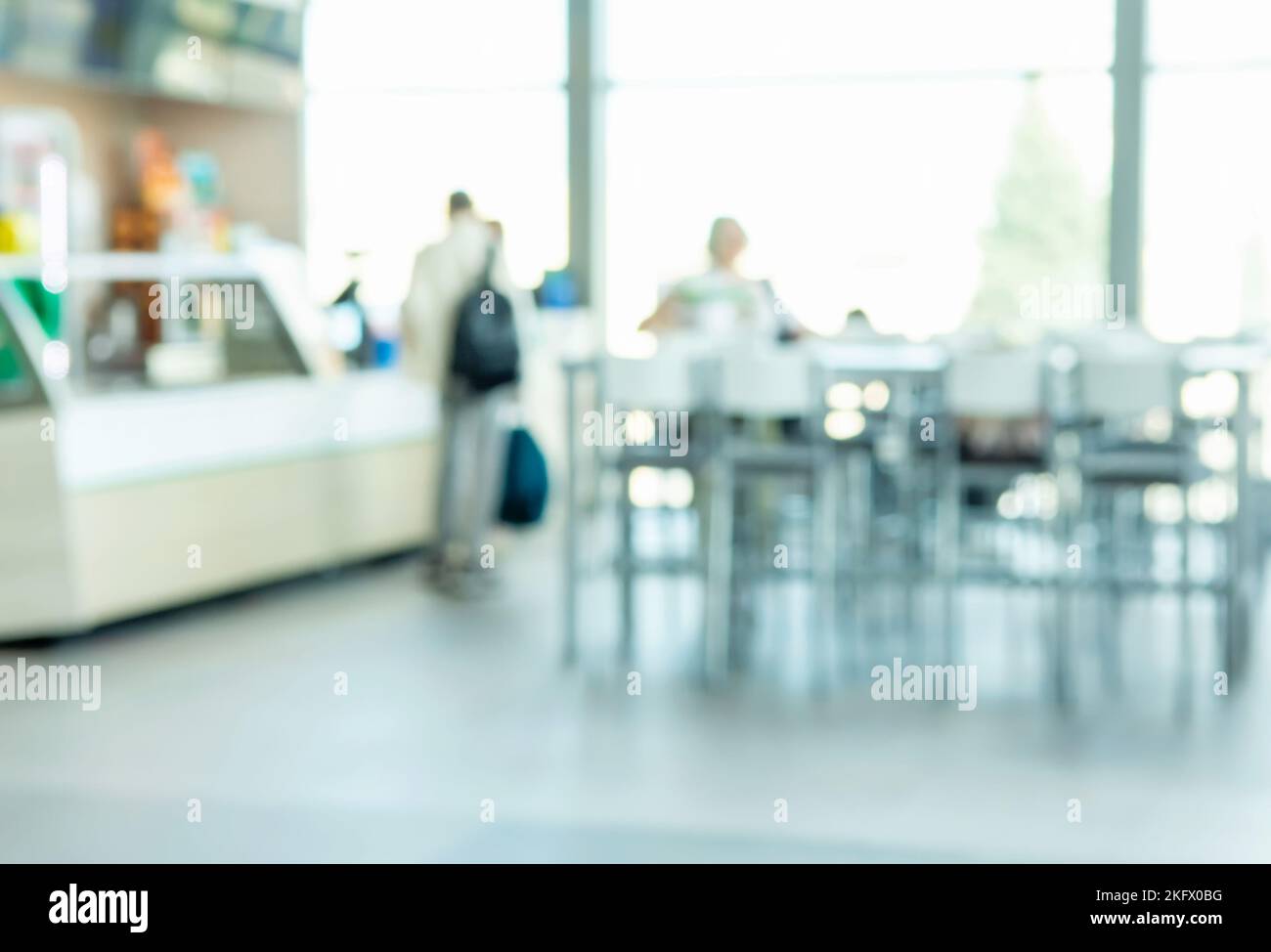 The background of the airport lounge is out of focus. The concept of ...