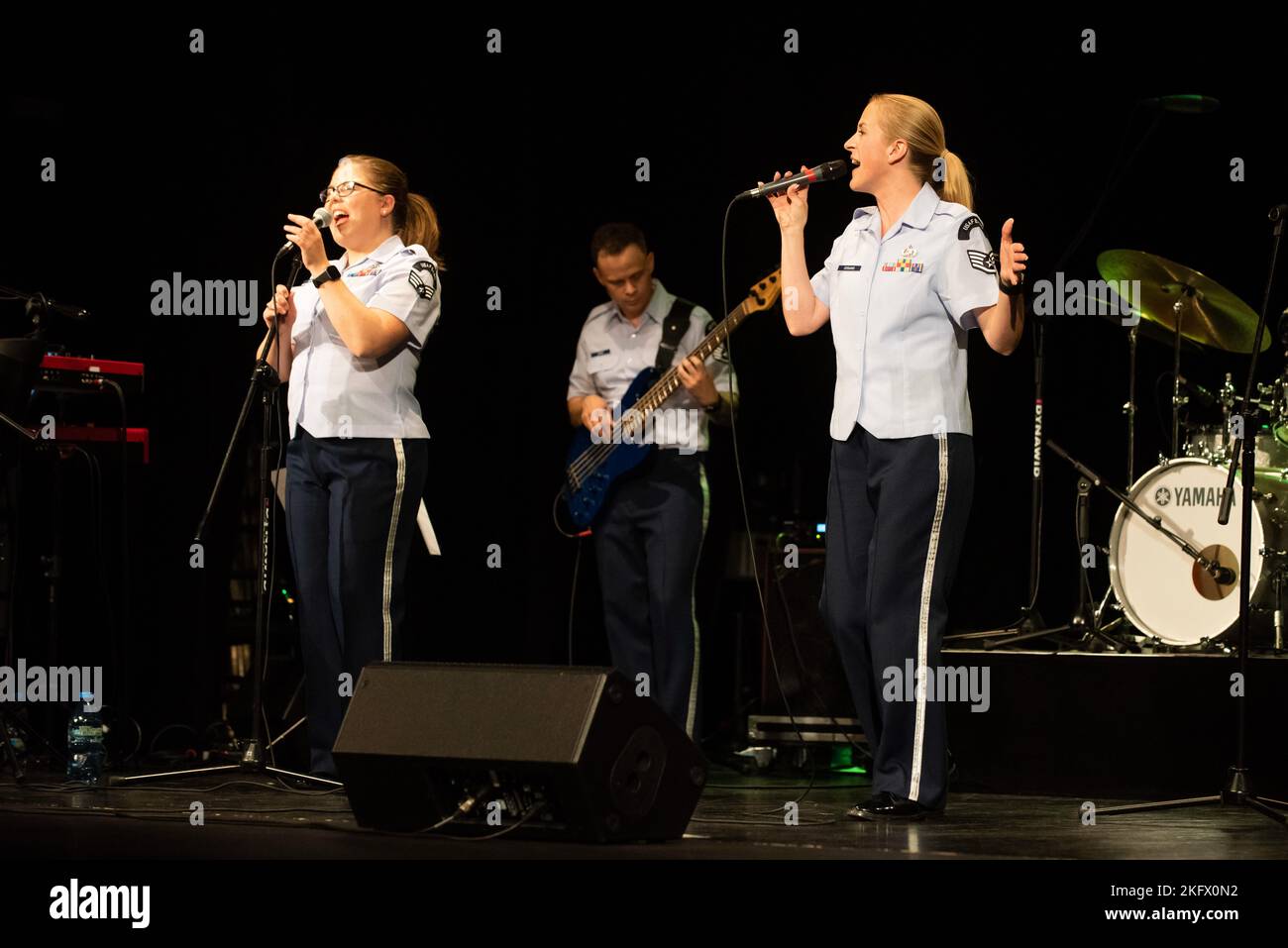 The U.S. Air Forces in Europe Ambassadors Rock Band performs at Club 4 ...