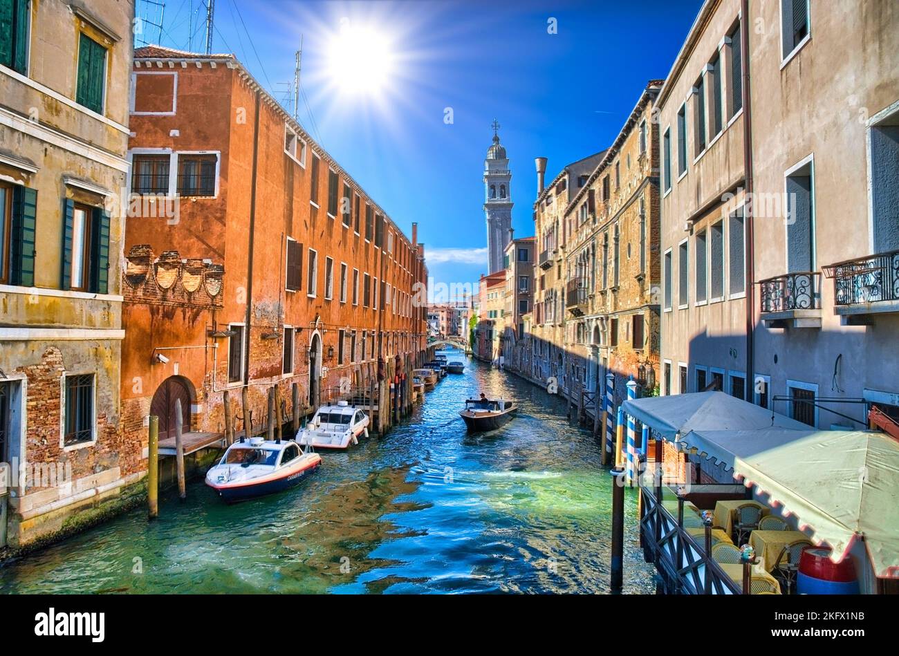 Scenic narrow canal with Carabinieri boats, Venice, Italy, HDR Stock ...