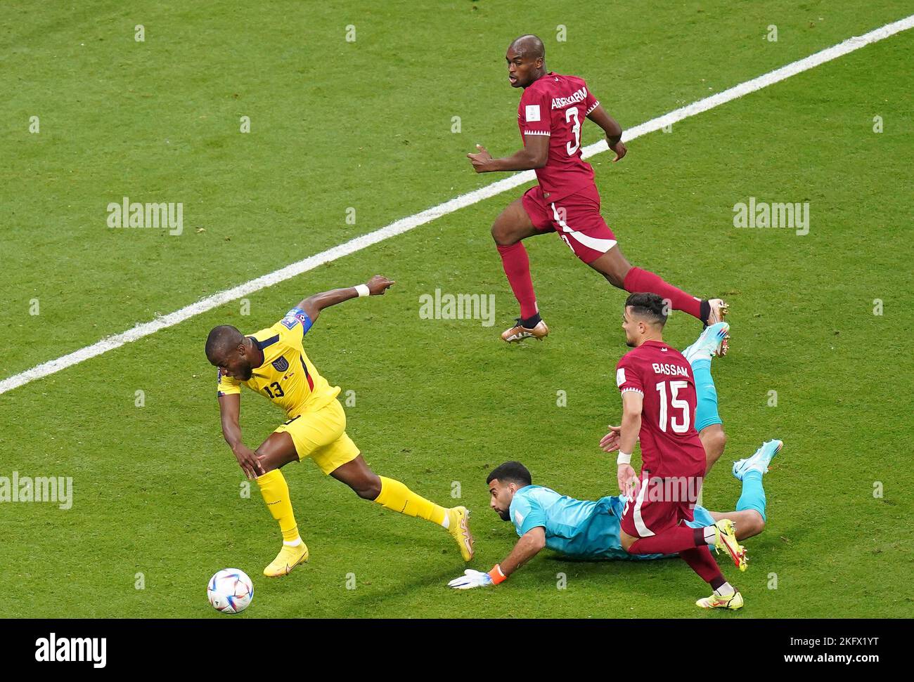 Ecuador's Enner Valencia is is brought down by Qatar goalkeeper Saad Al ...