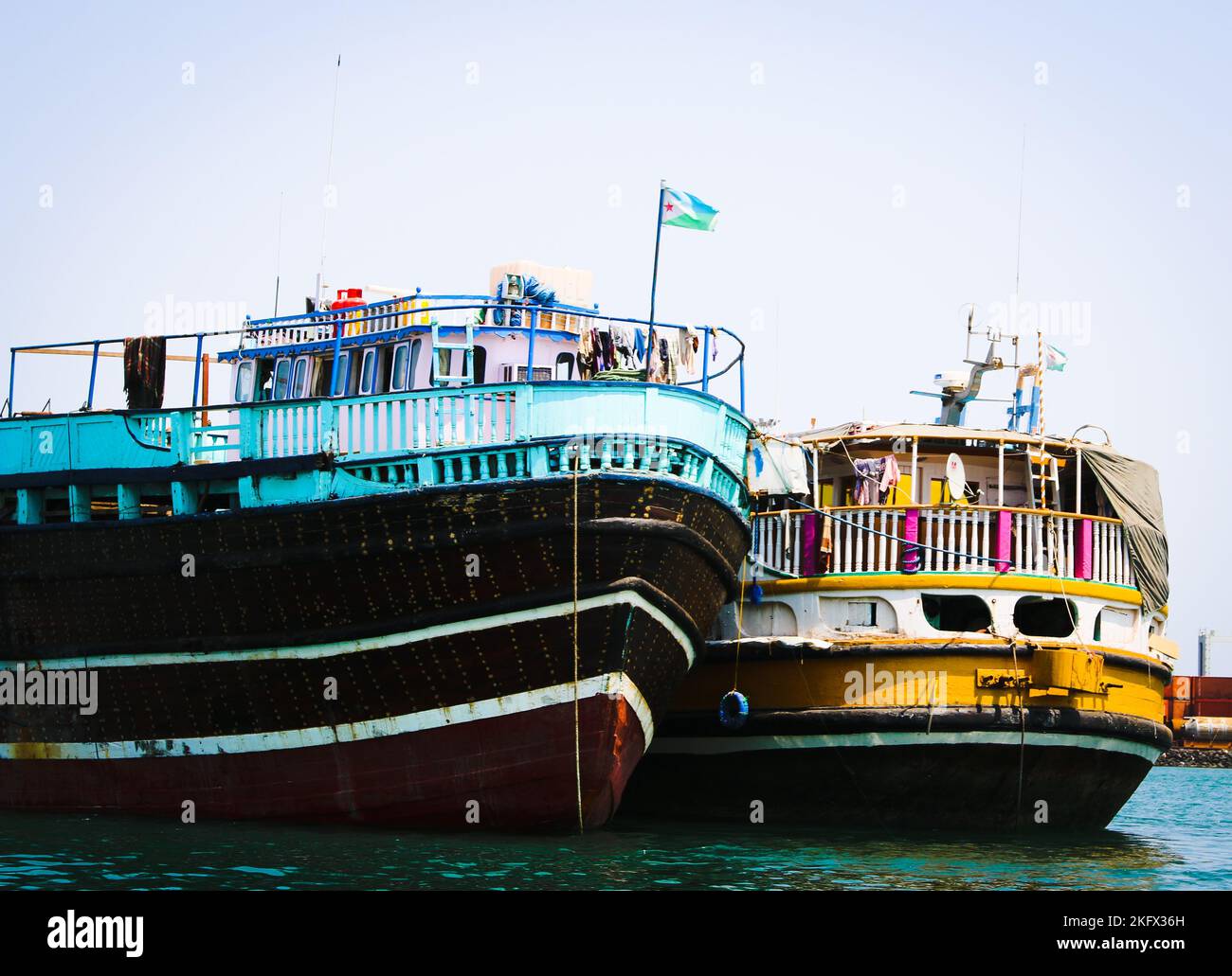 Traditional dhow ships in the sea in Djibouti against the background of ...