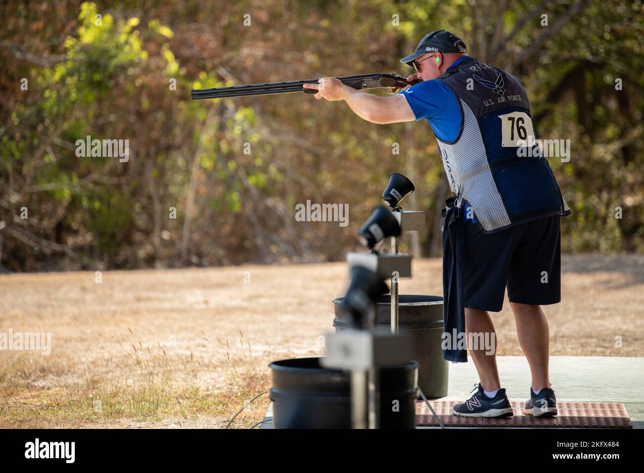 U.S. Air Force Major Daniel Rich, Air Force Services Center, aims his ...