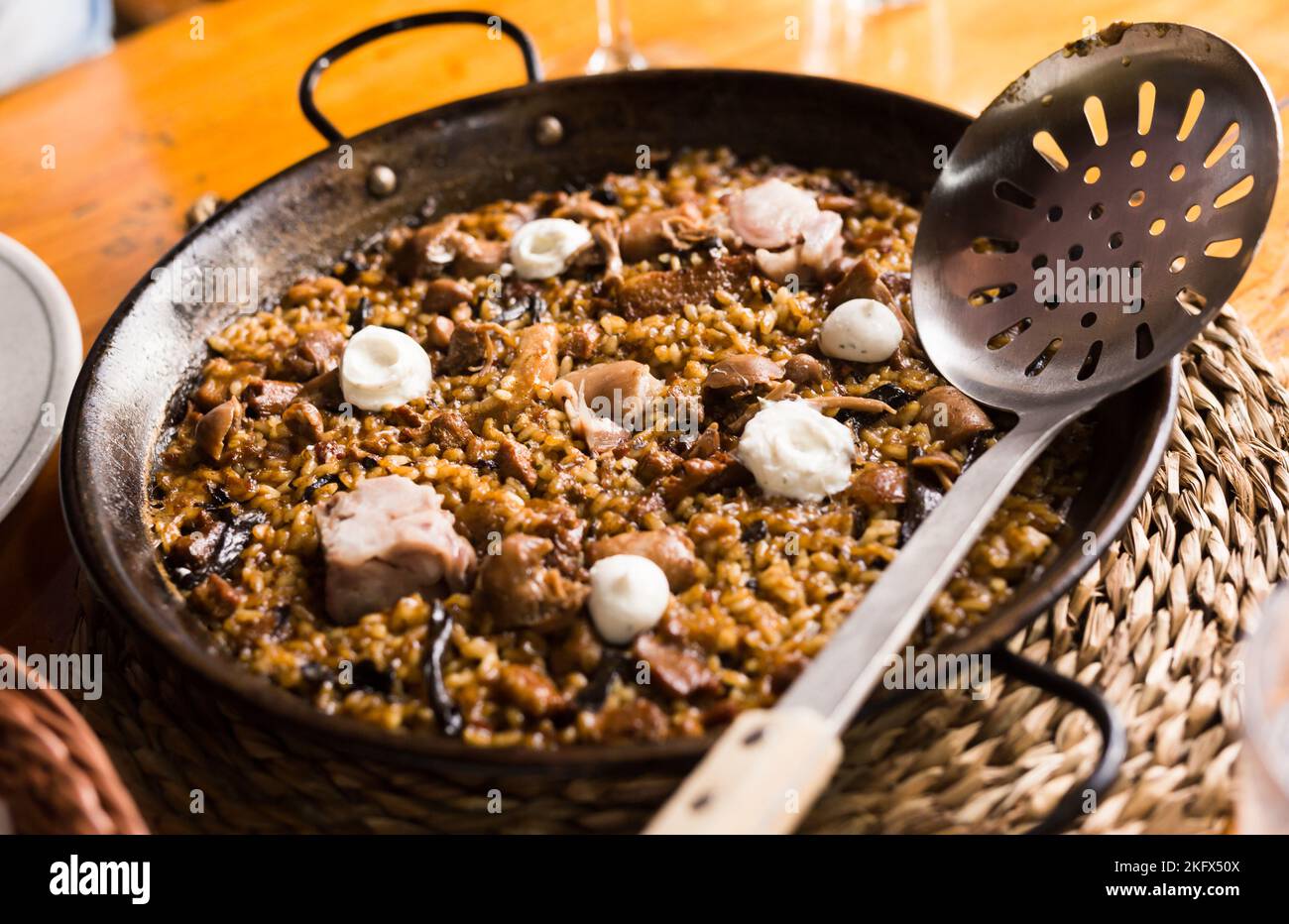 delicious Catalan mountain rice with mushrooms and pork feet Stock ...