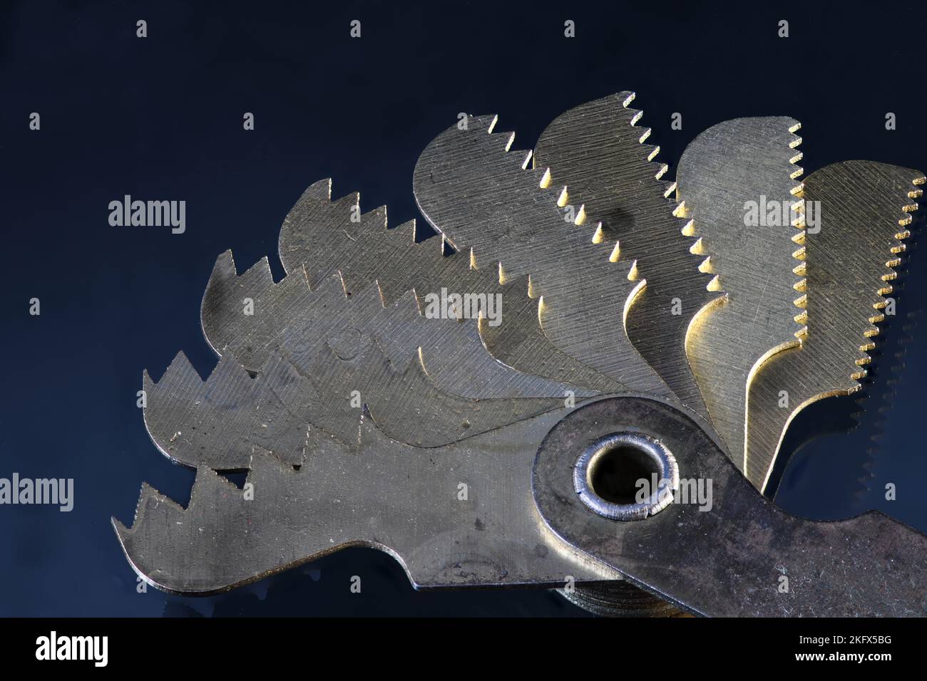 Thread Pitch Gauge on dark background Stock Photo - Alamy