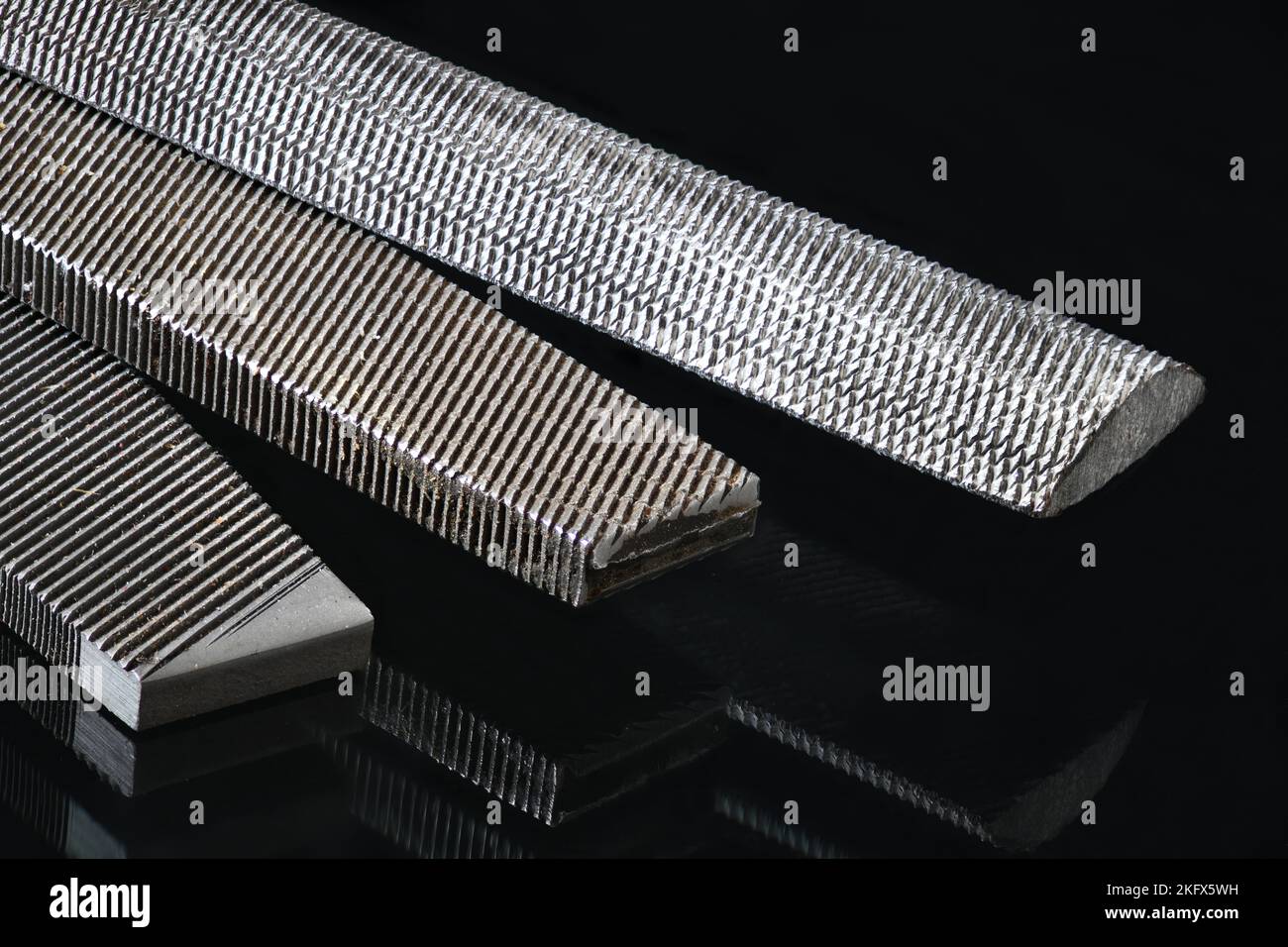 Hand File close up on dark Glass Stock Photo - Alamy