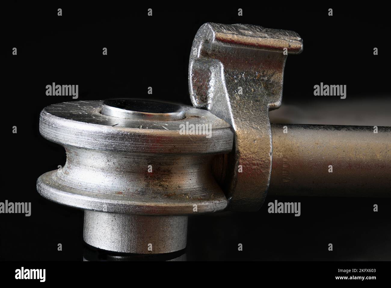 Hand Tube Bender on dark background Stock Photo - Alamy