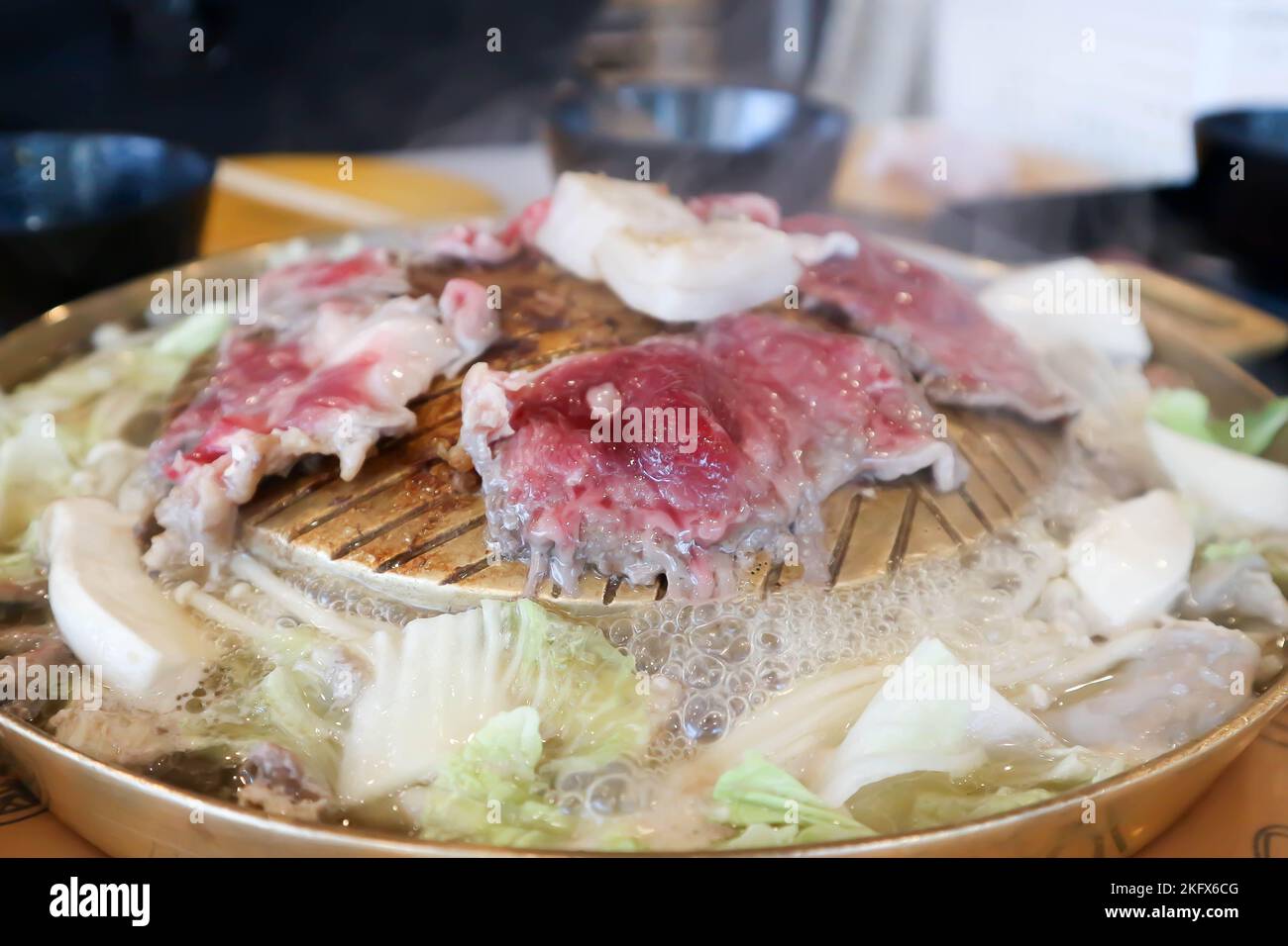 grilled beef and grilled pork in the oven Stock Photo - Alamy