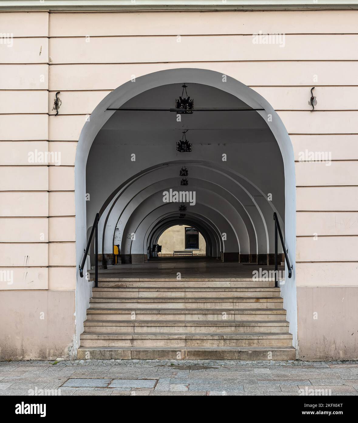 A pathway tunnel with arch entrance Stock Photo - Alamy