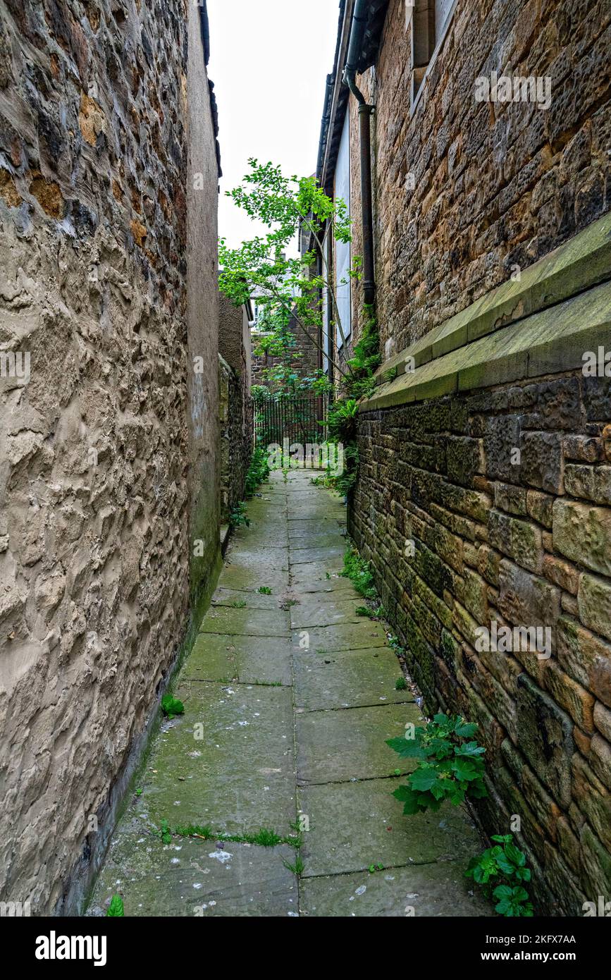 Alley between buildings Stock Photo - Alamy