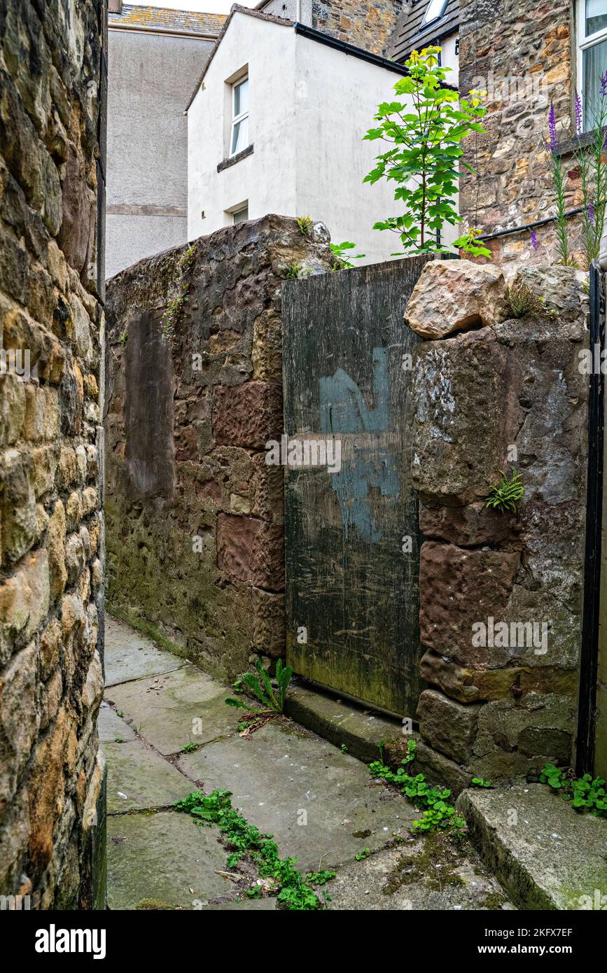 Narrow alley between buildings Stock Photo - Alamy