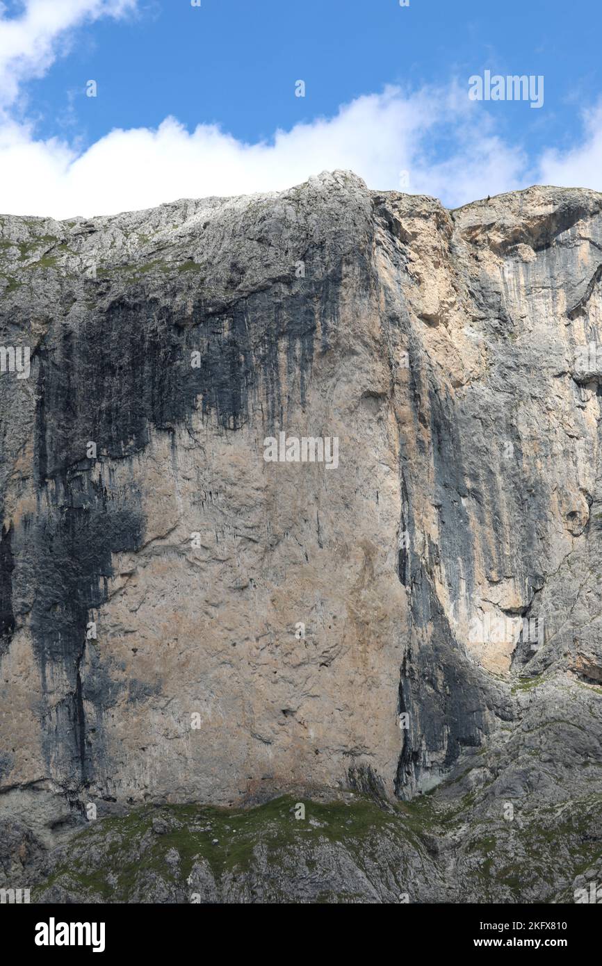 huge rock wall ideal for learning to climb in the Italian Alps in the ...