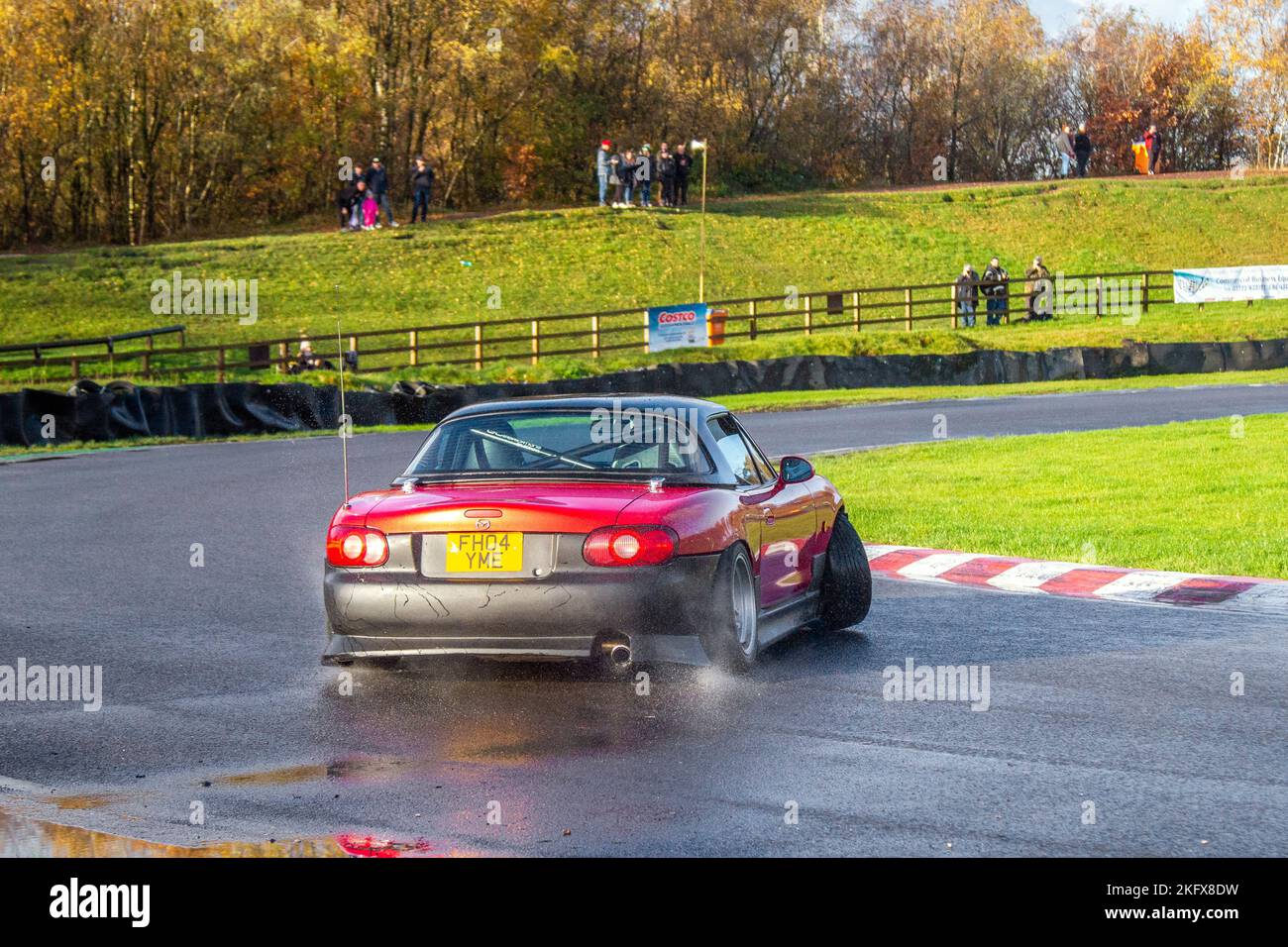 2004 Red MAZDA MX5I 1839cc 5 speed manual; High speed cornering on wet ...