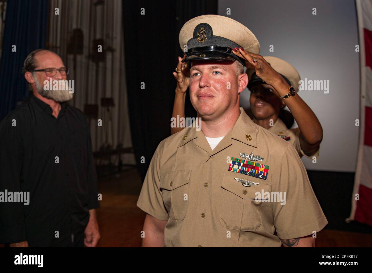 221013-N-YP095-1001 VIRGINIA BEACH, VA. (Oct. 13, 2022) Sailor receives ...