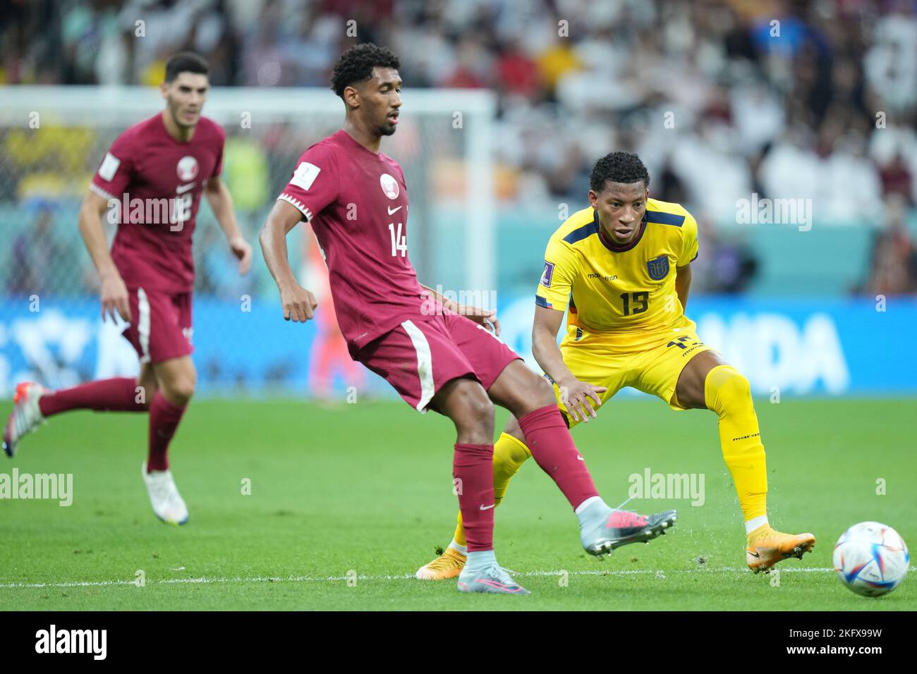 Gonzalo Plata of Ecuador and Ahmed Homam of Qatar during the Qatar 2022 ...