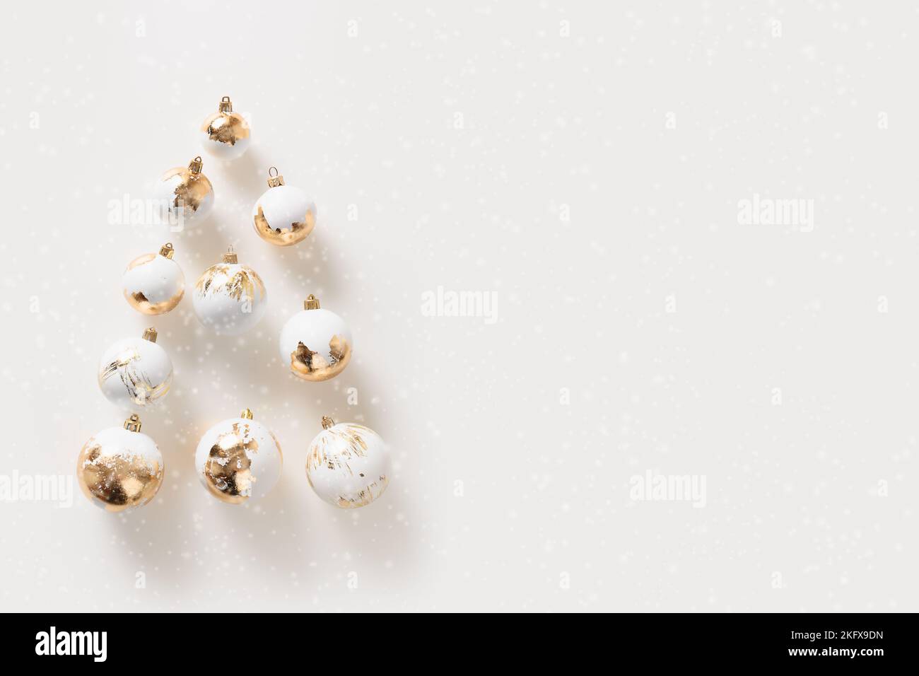 Banner with modern Christmas Tree made of golden and white balls on ...