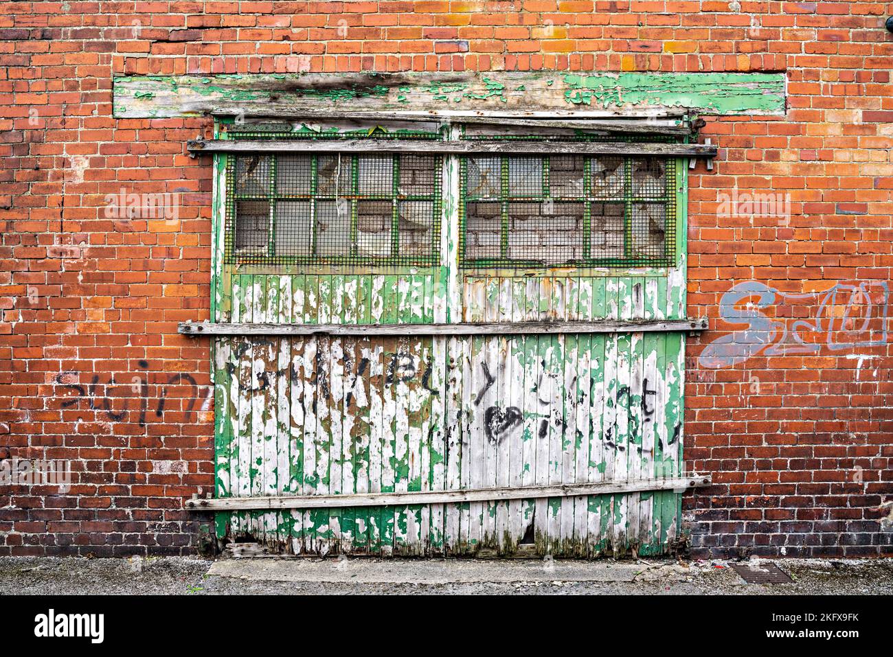 Bricked up, disused commercial building Stock Photo - Alamy