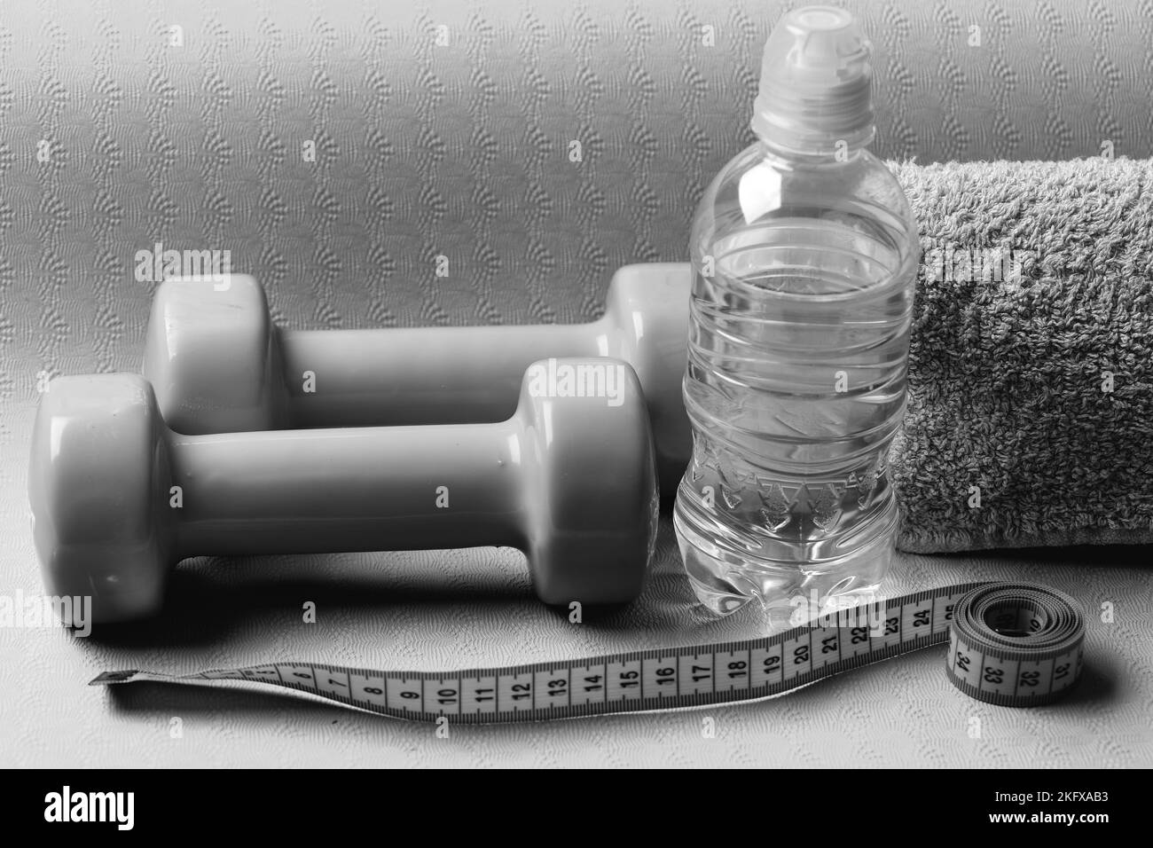 Water bottle dumbbells yoga Black and White Stock Photos & Images - Alamy