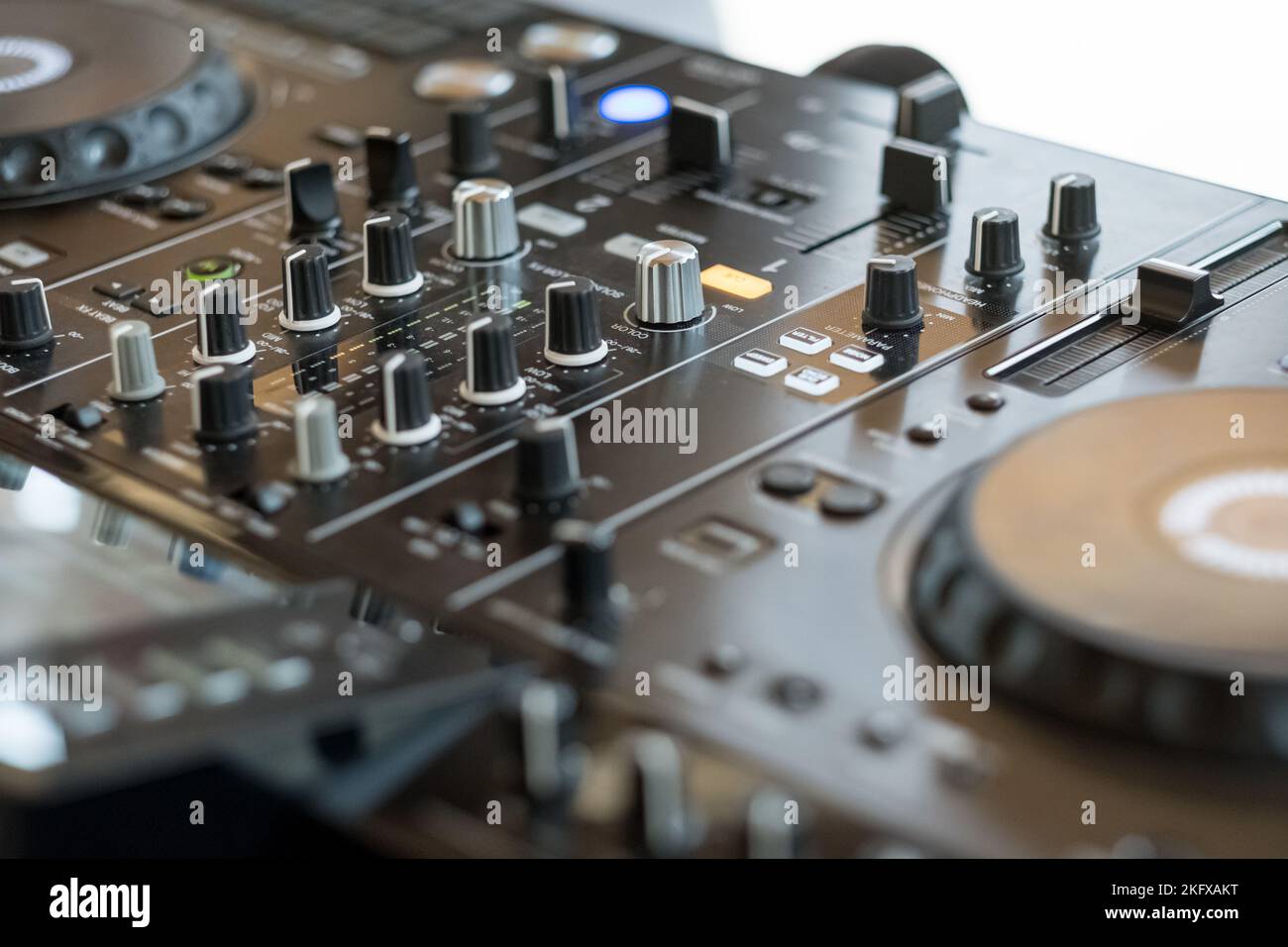 Dj mixer at a party playing rock pop regueton music Stock Photo - Alamy
