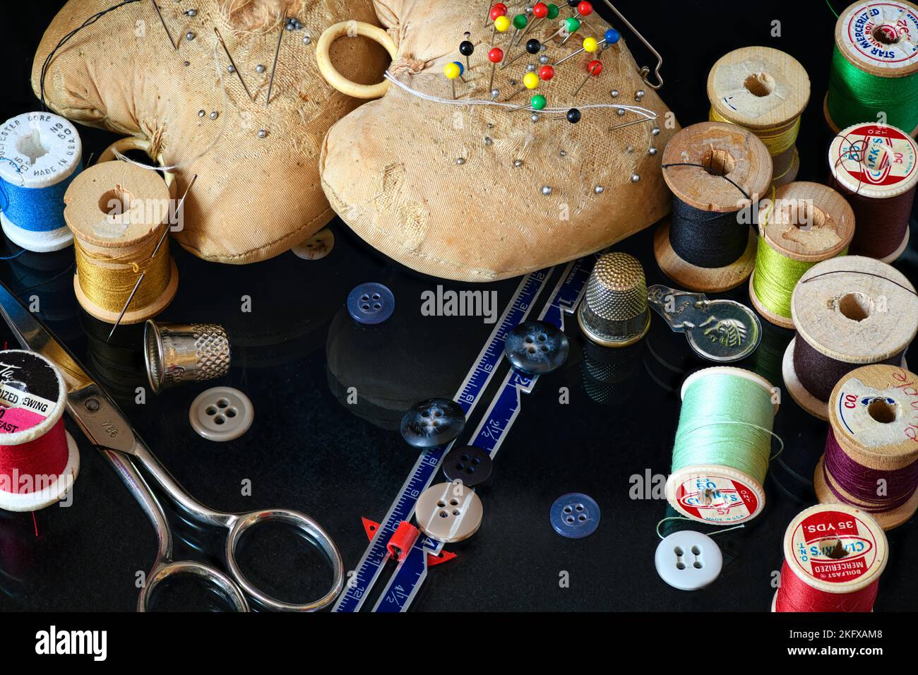 Vintage Sewing Collection on dark background Stock Photo - Alamy
