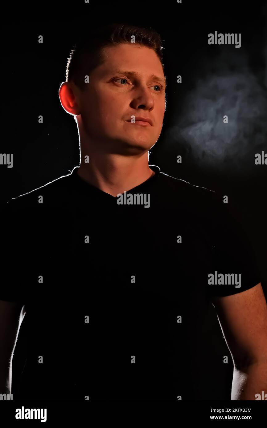 silhouette of a guy. men in the dark. smoke . steam . man in a dark ...