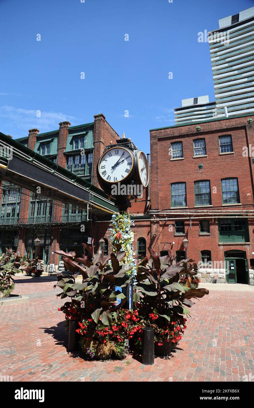 The clock in the Historic Distillery District in Toronto, Canada Stock ...